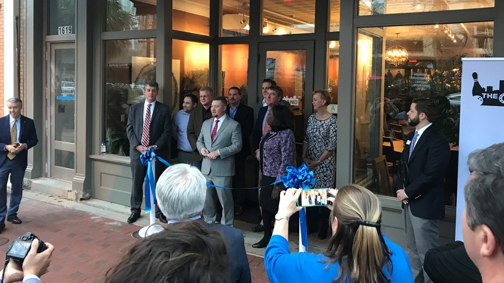 The Grand Ribbon Cutting – Lambert Architecture + Construction Services
